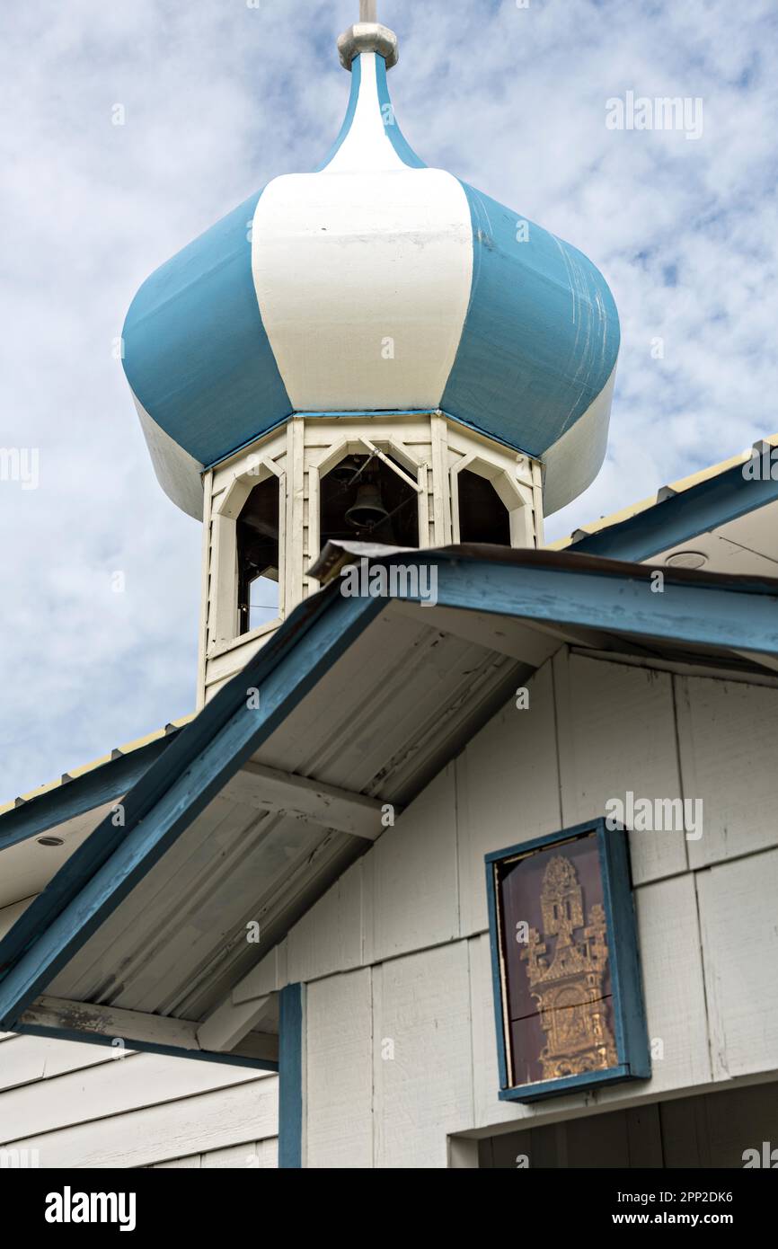 The blue and white striped onion dome and ornate entrance of Saint ...