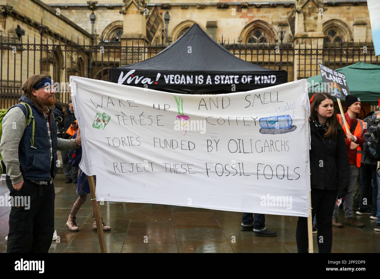 London, UK. 21st Apr, 2023. Members of Extinction Rebellion hold a ...