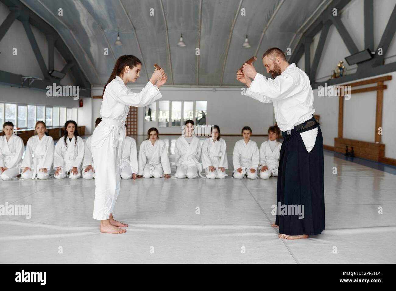 Greeting of sensei and student before battle with wooden sword Stock ...