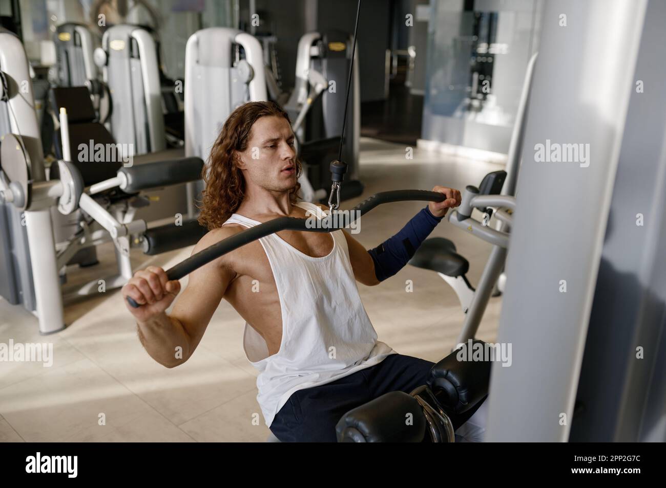 Man having strength workout in hi-res stock photography and images - Alamy
