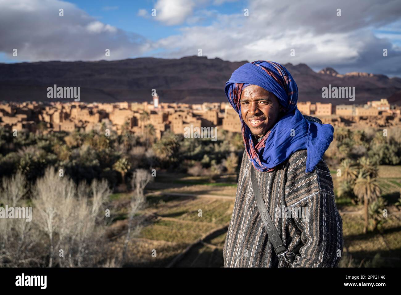 Portrait of a young man dressed in the typical clothes of Berber nomads ...