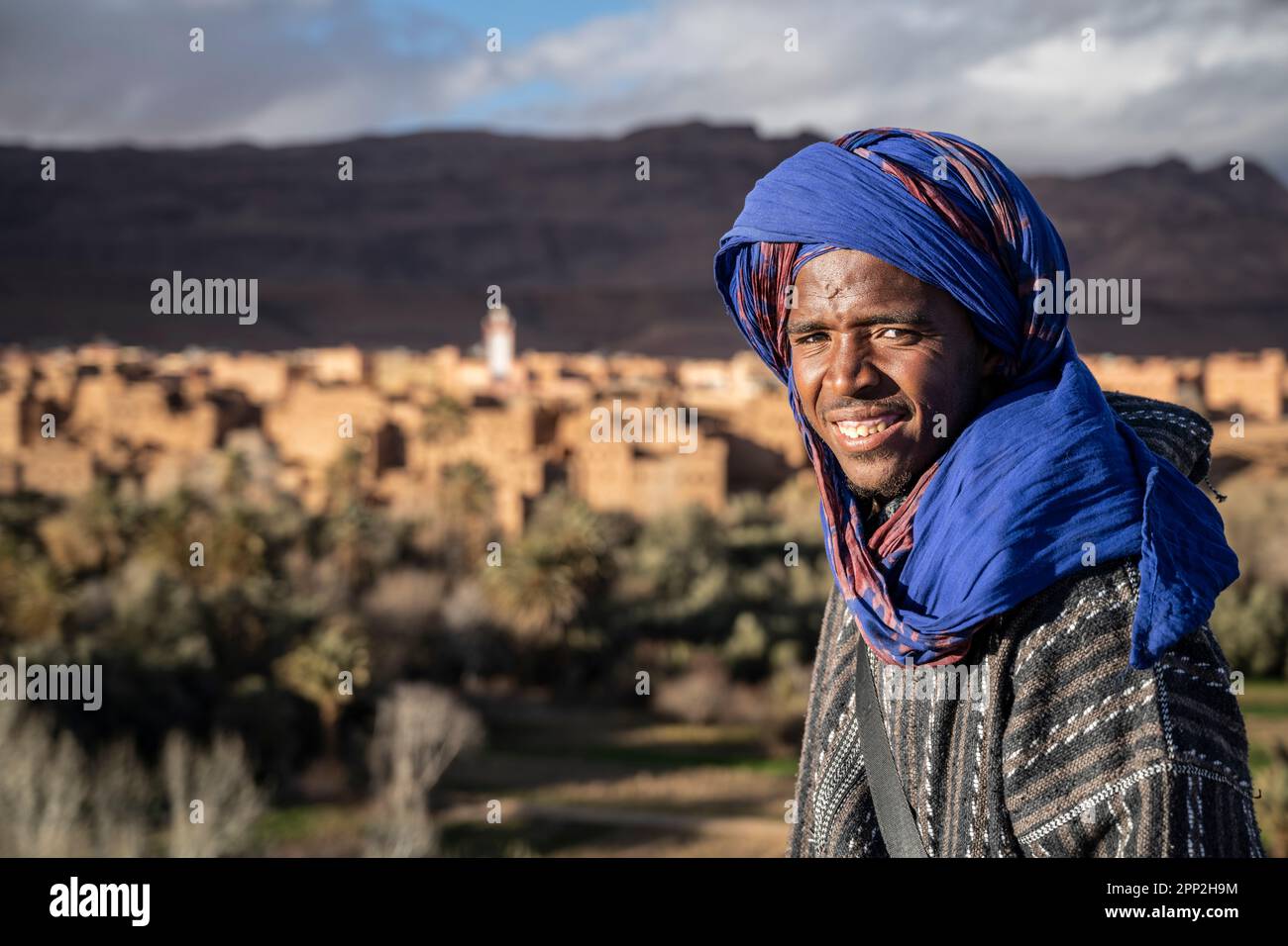 Portrait of a young man dressed in the typical clothes of Berber nomads ...