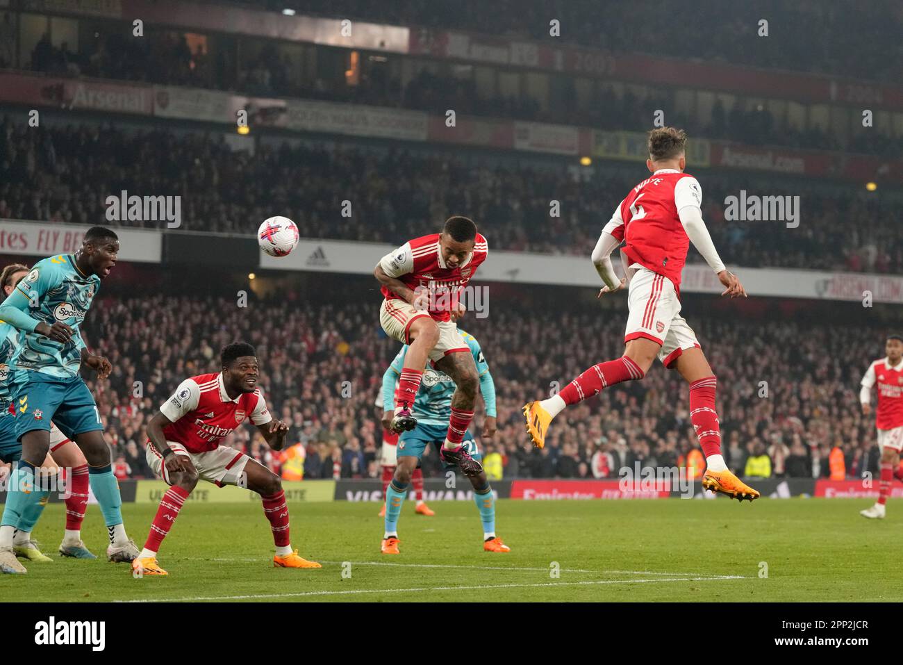 Arsenal's Gabriel Jesus, center, heads the ball during the English ...