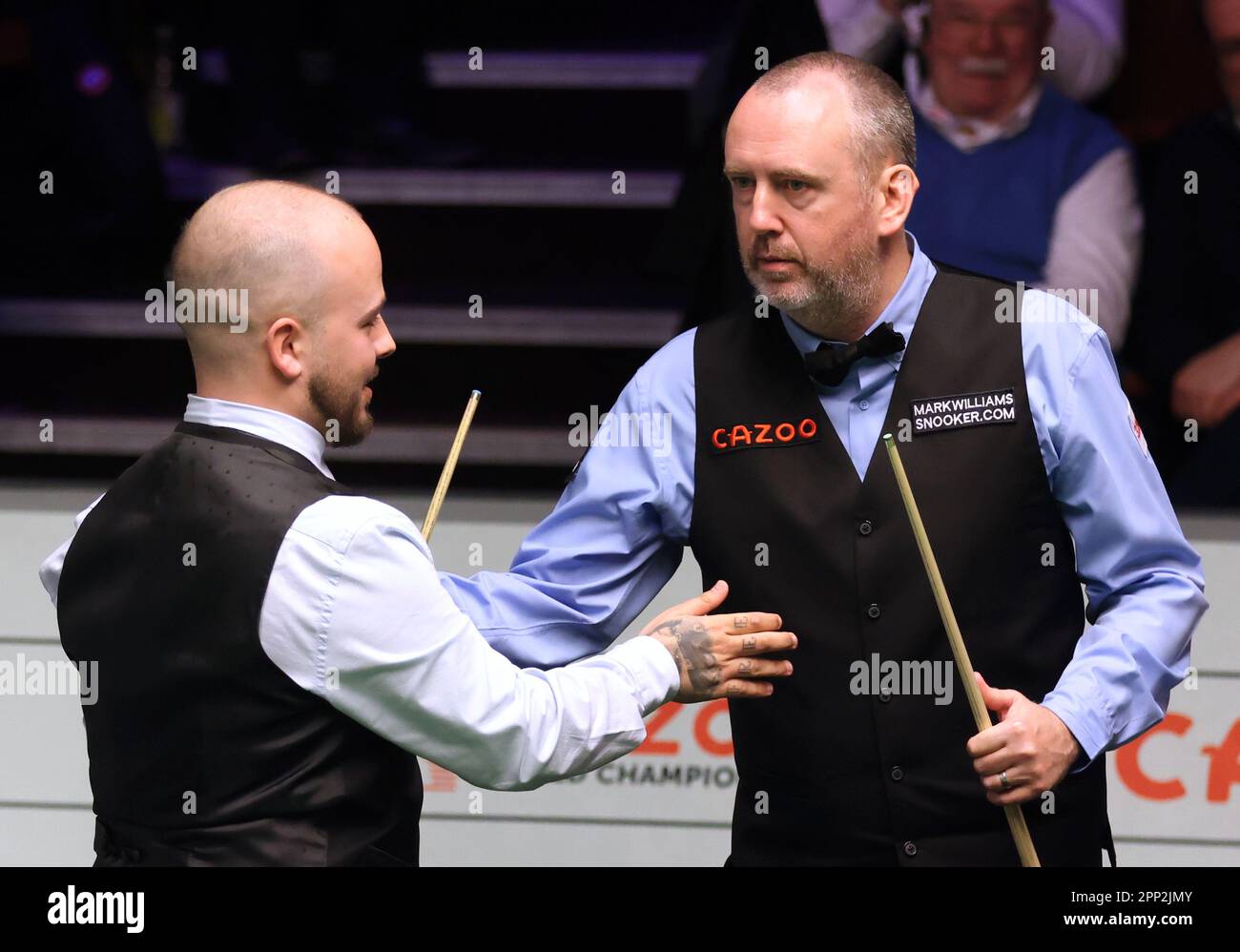 Luca Brecel (left) is congratulated by Mark Williams after their match ...