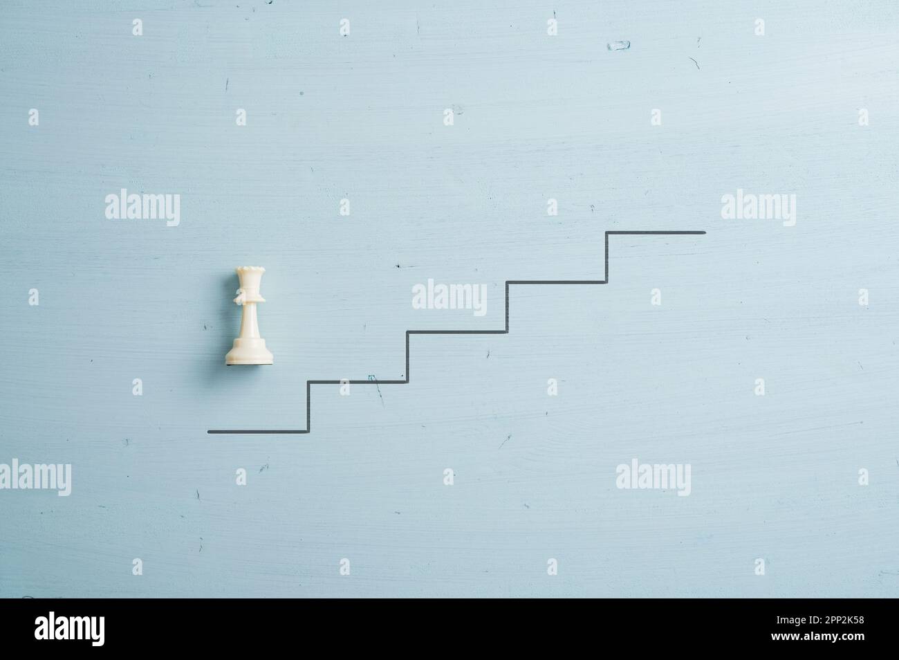 White king chess figure placed at the beginning of a hand drawn ...