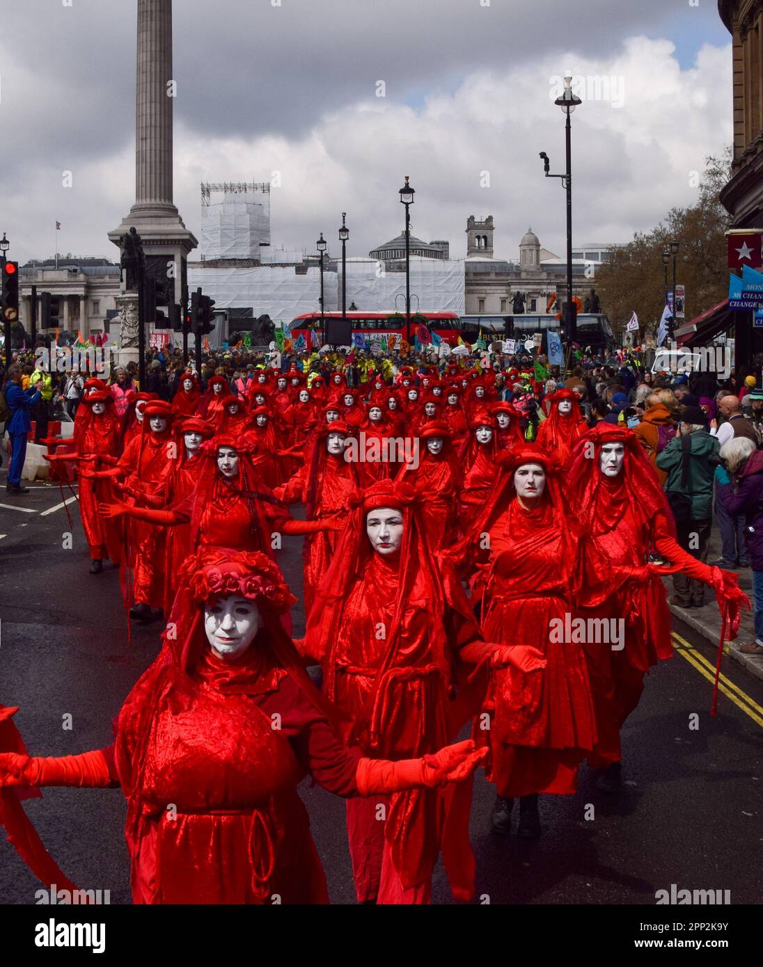 London, UK. 21st April 2023. Red Rebels pass through Whitehall as ...