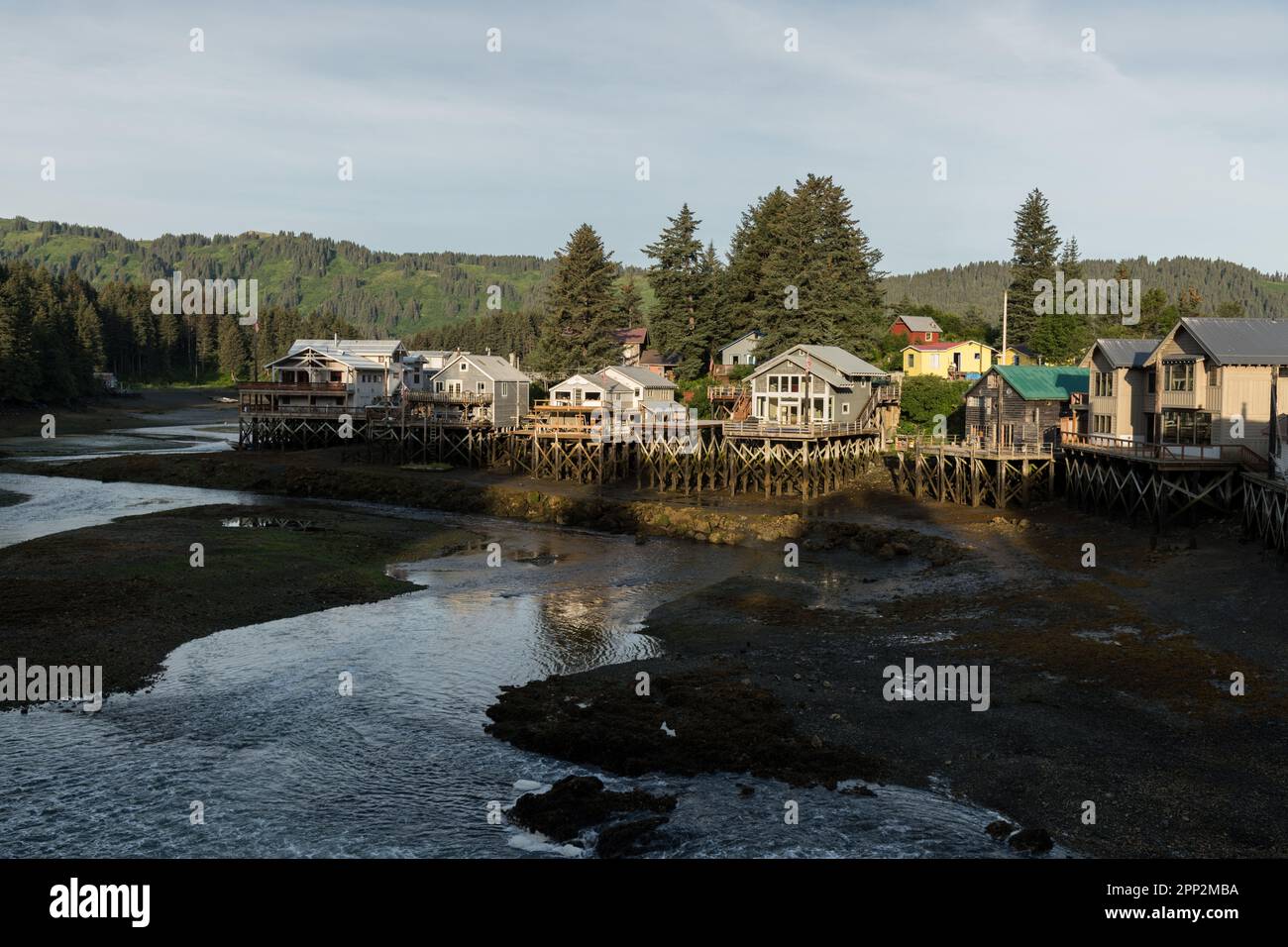Stilt cottages rising above the waterfront to keep them above the tidal ...