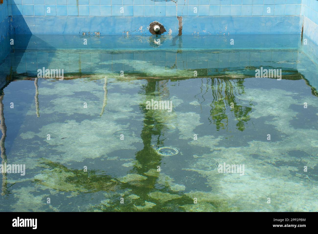 A half full abandoned and deteriorated swimming pool Stock Photo - Alamy