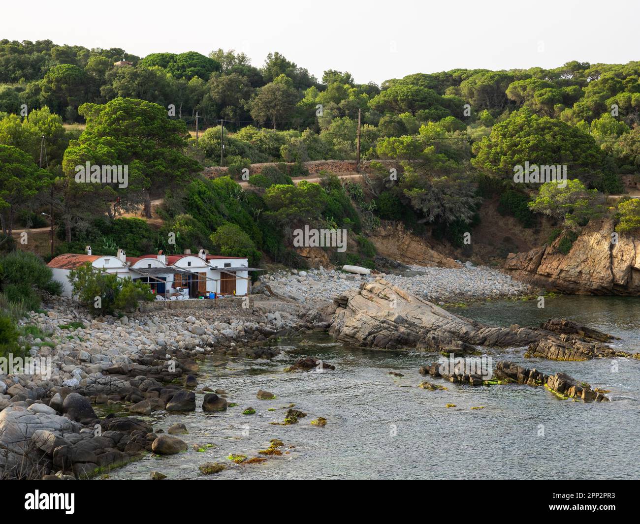 A picturesque bay in Palamos, Costa Brava, Spain, featuring a white ...