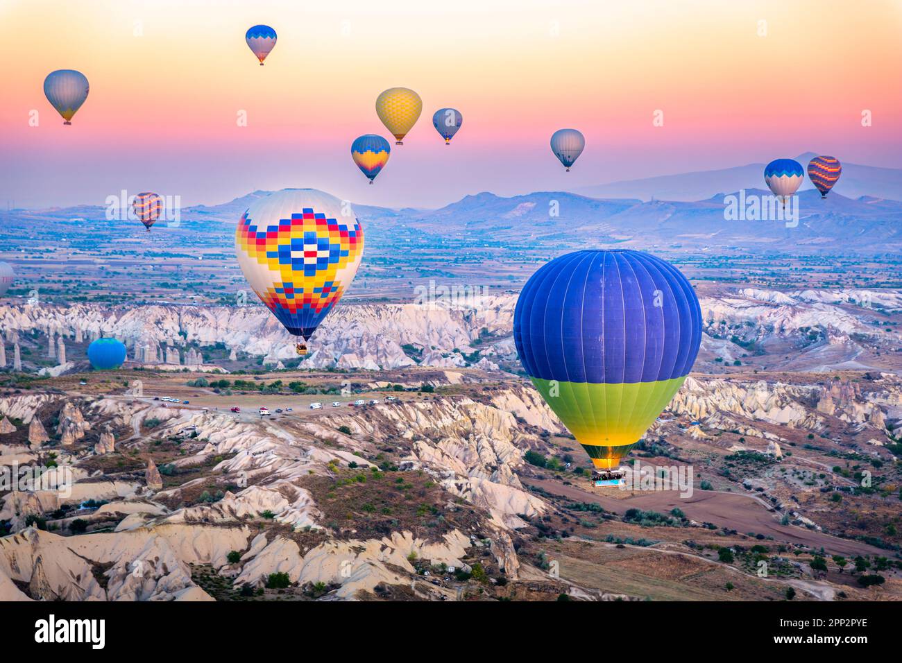 Aerial view of a fleet of hot air balloons, in Cappadocia, Turkey Stock ...