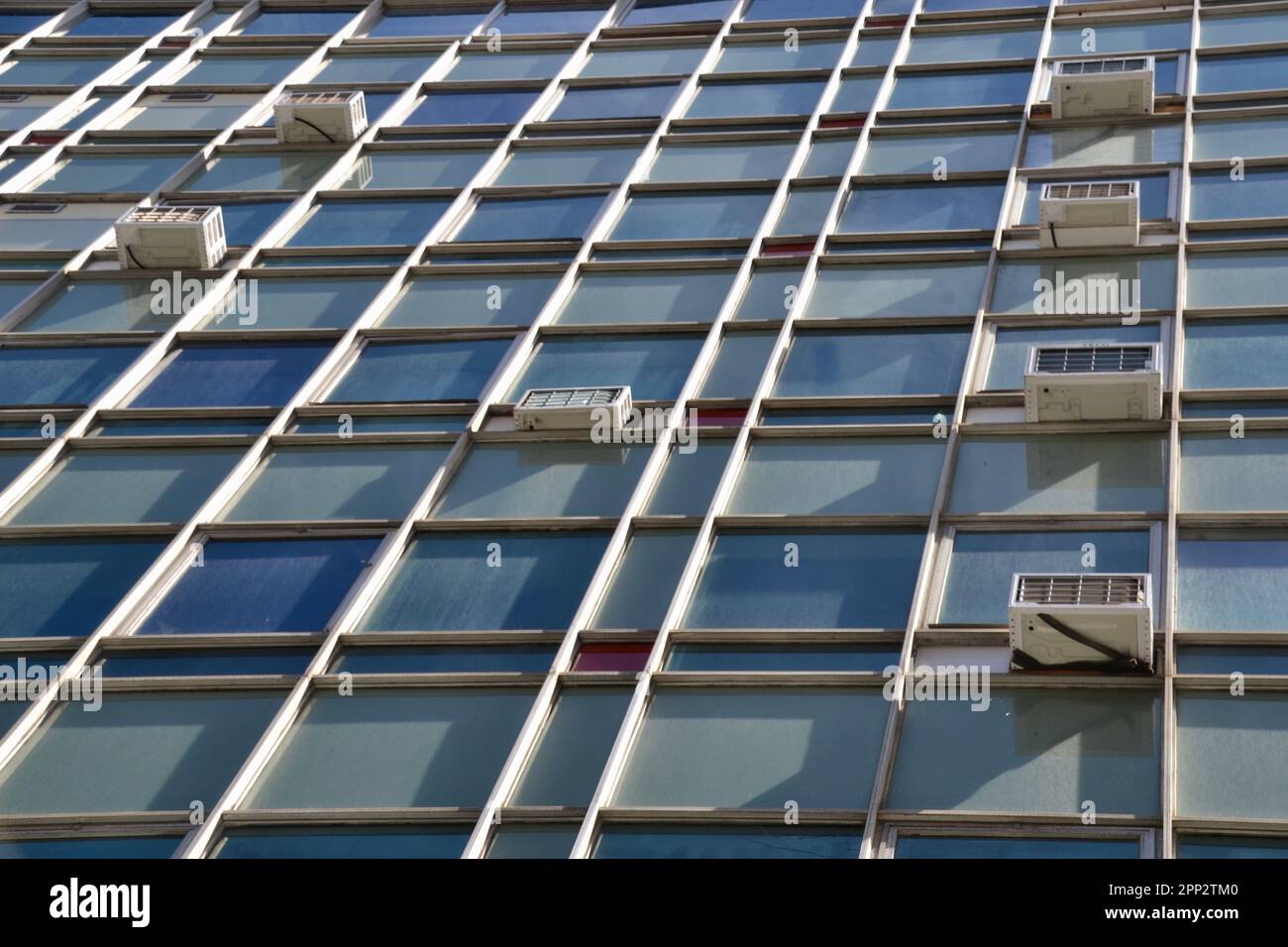 Old glass and steel inefficient commercial building in Adelaide CBD ...