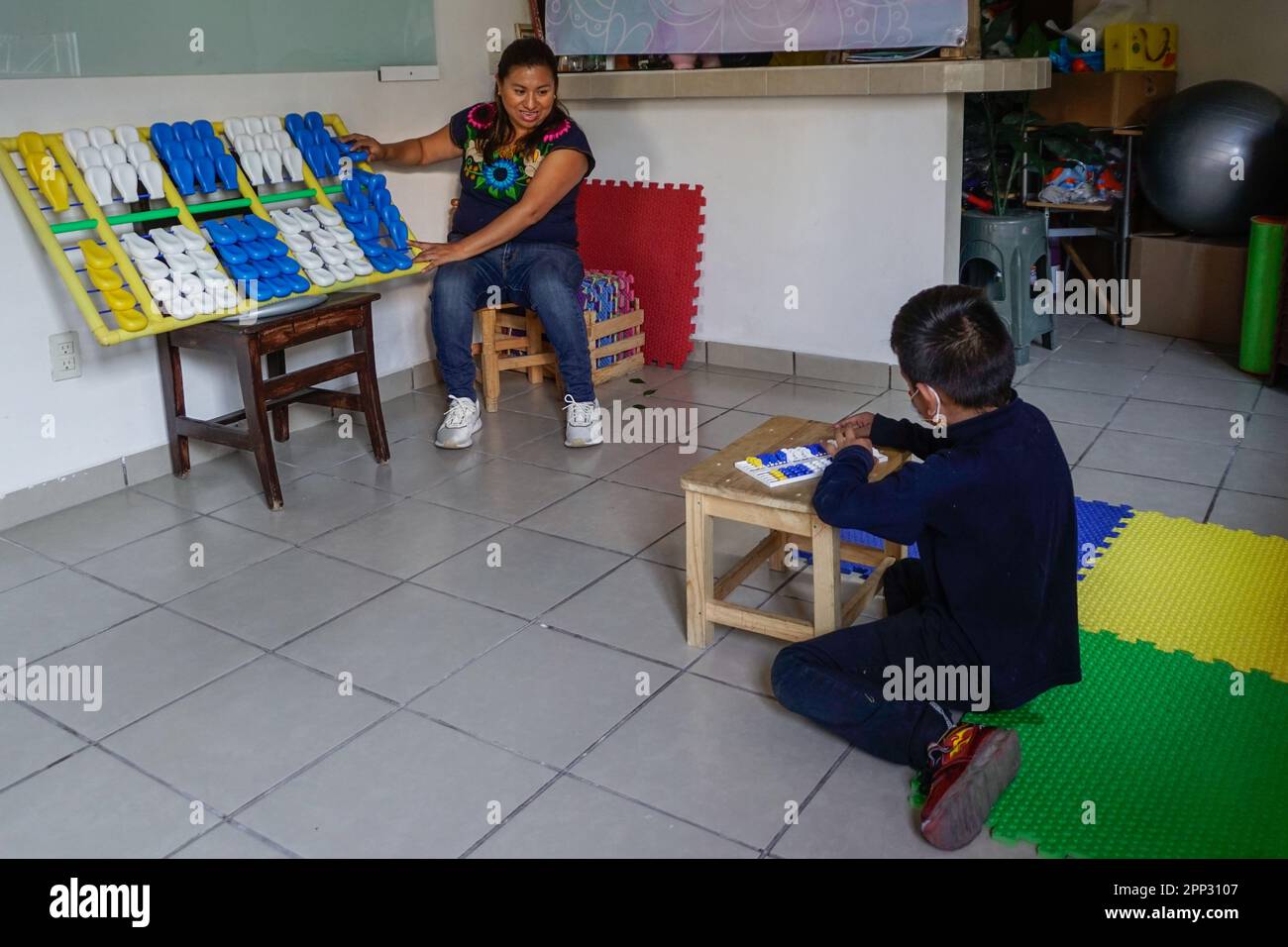 Gisela Gómez teaches how to calculate with a nepohualtzintzin, a pre ...