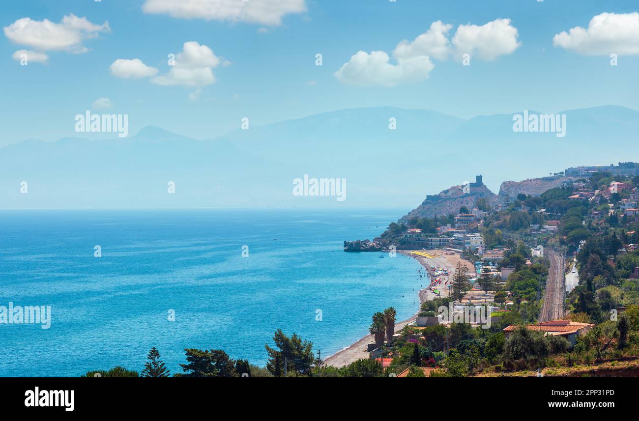 Azure Tyrrhenian sea bay and Rock of Capo Zafferano view from coastline ...