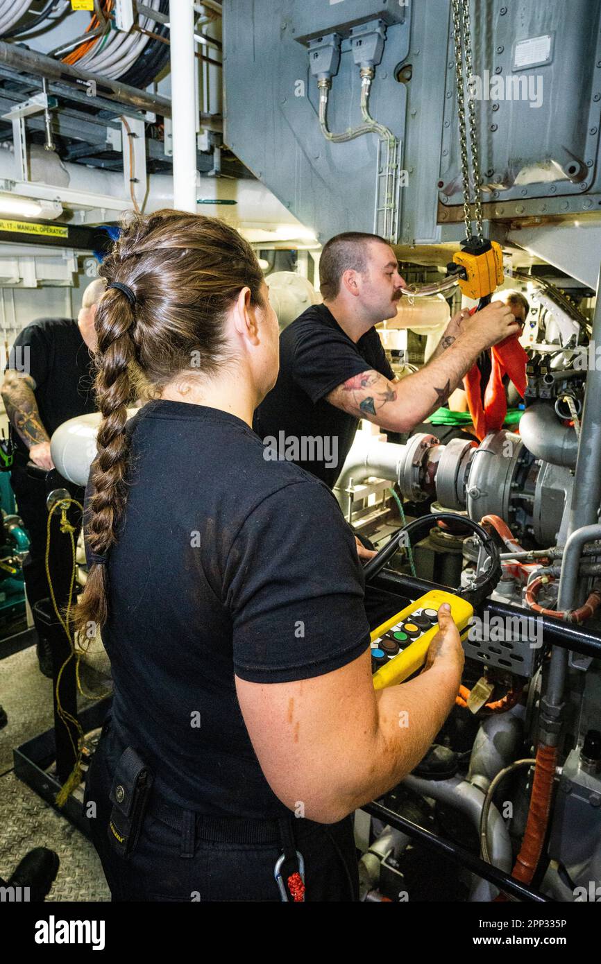 Royal Canadian Navy engineering personnel onboard HMCS Margaret Brooke ...