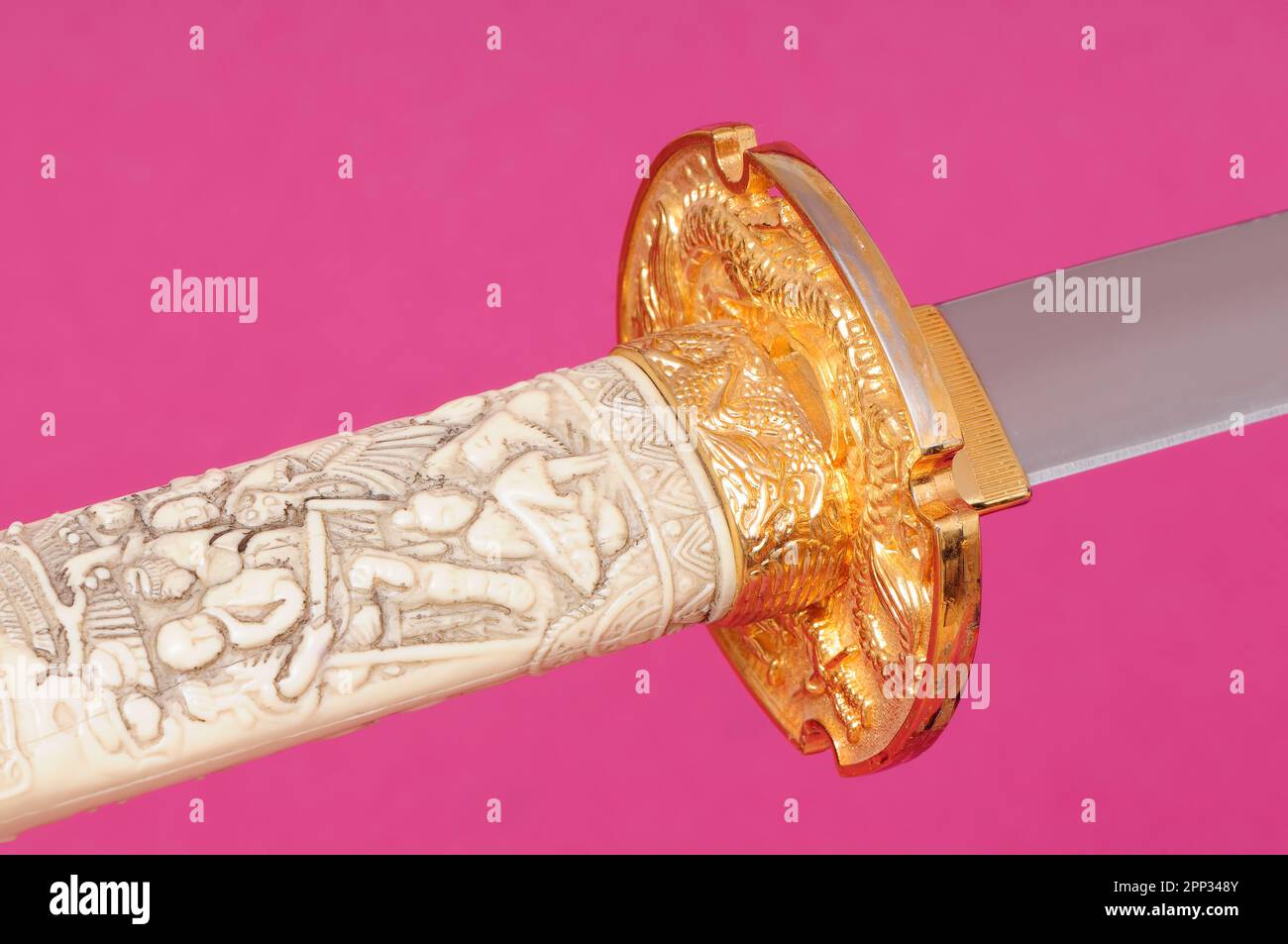 Samurai sword isolated on a pink background Stock Photo - Alamy
