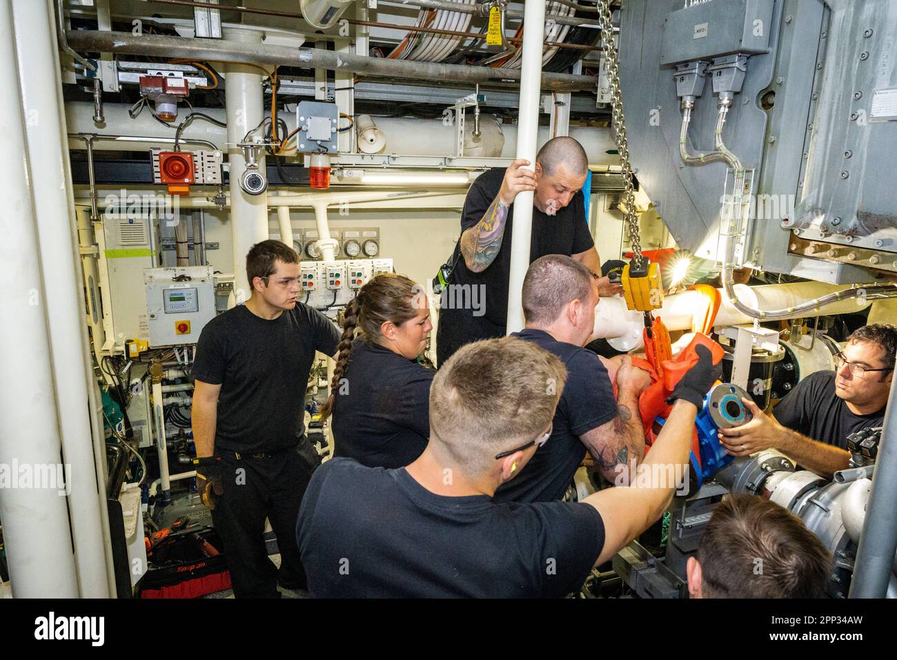 Royal Canadian Navy engineering personnel onboard HMCS Margaret Brooke ...