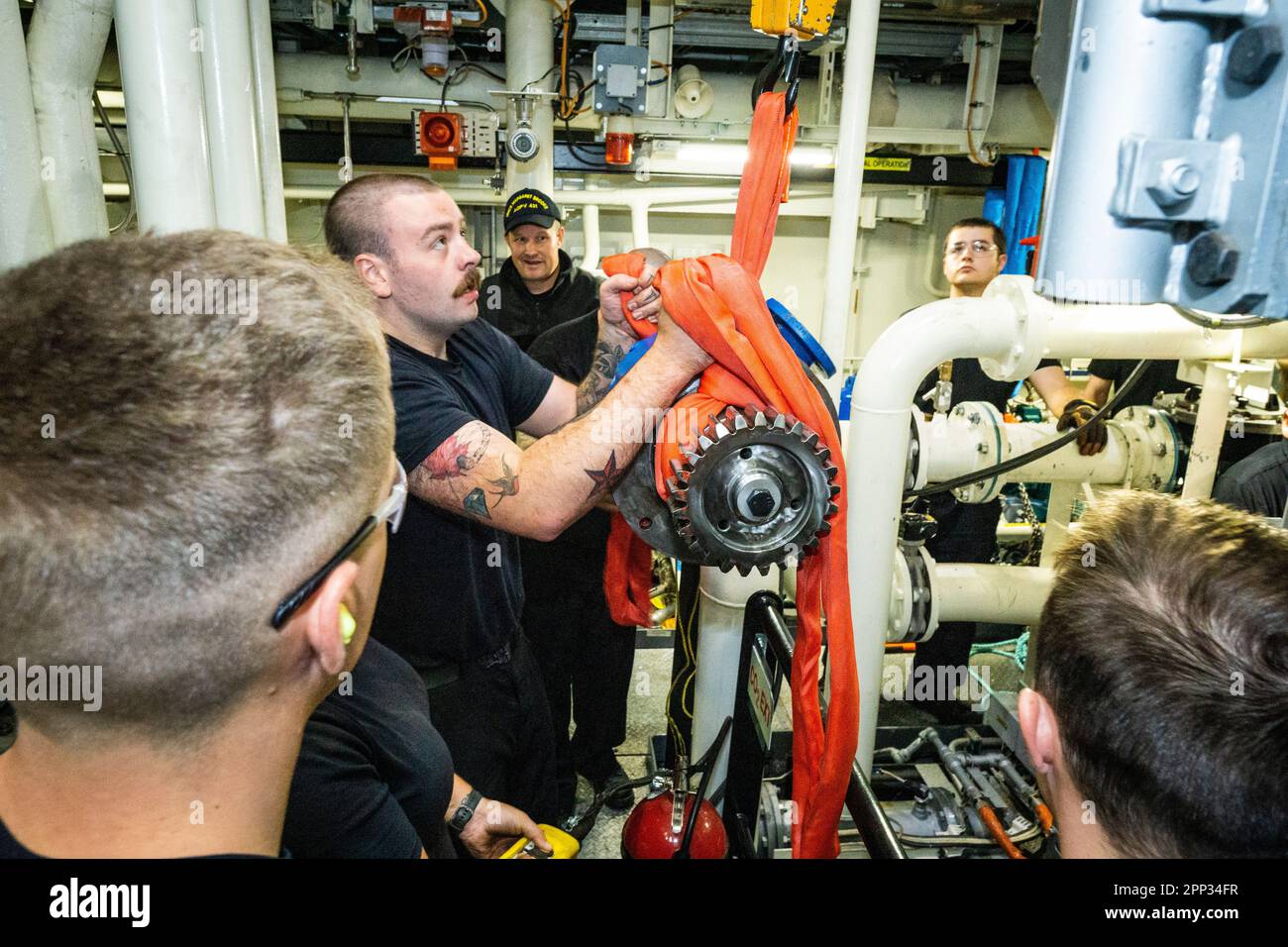 Royal Canadian Navy engineering personnel onboard HMCS Margaret Brooke ...