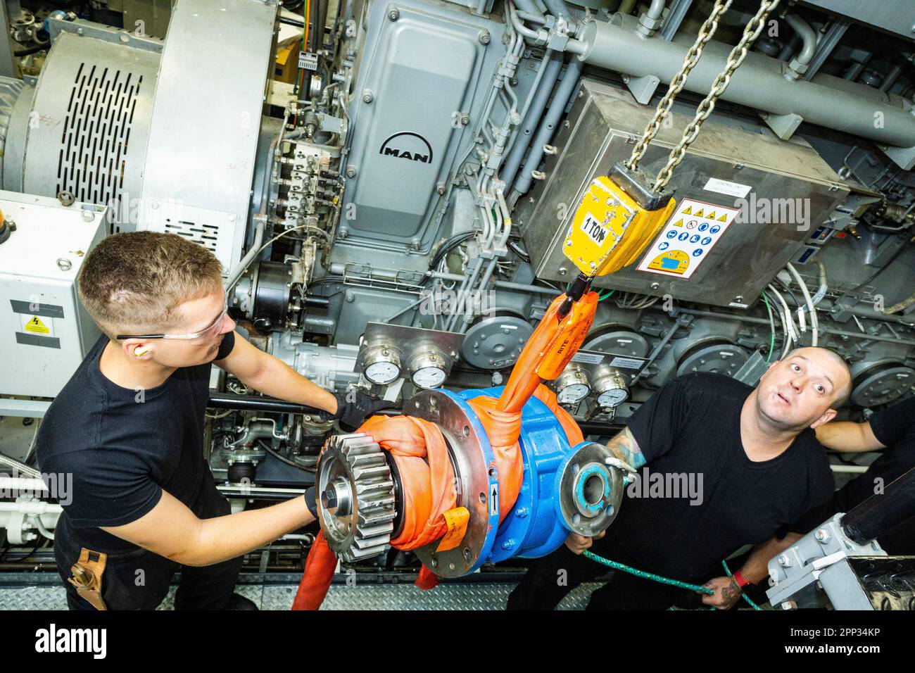 Royal Canadian Navy engineering personnel onboard HMCS Margaret Brooke ...