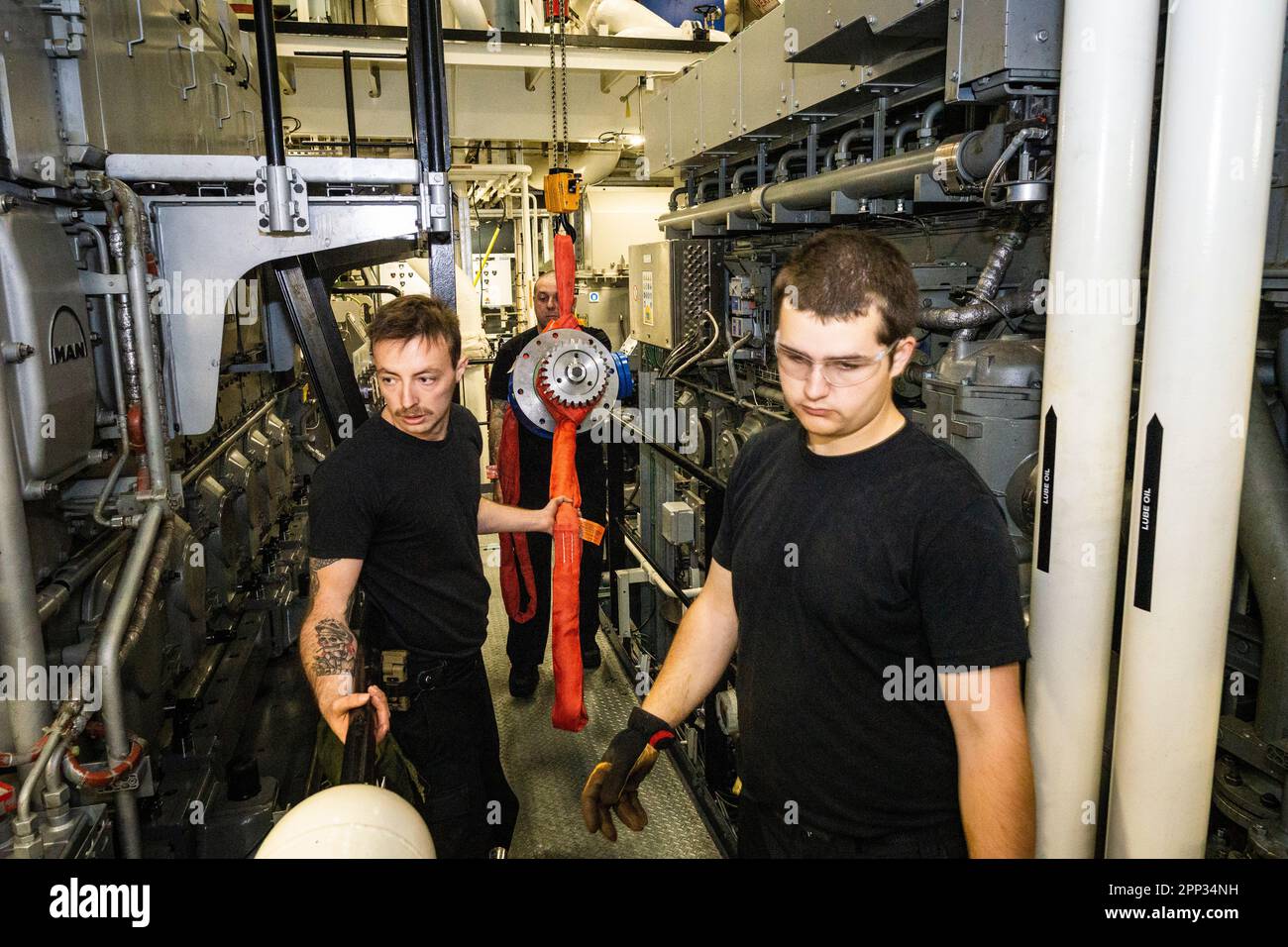 Royal Canadian Navy engineering personnel onboard HMCS Margaret Brooke ...