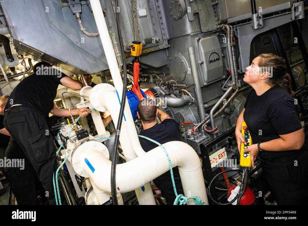 Royal Canadian Navy engineering personnel onboard HMCS Margaret Brooke ...