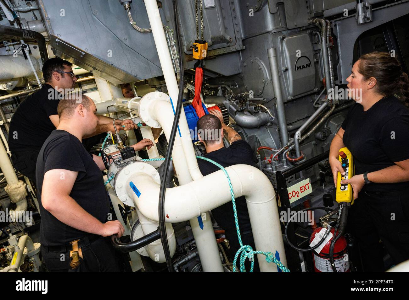 Royal Canadian Navy engineering personnel onboard HMCS Margaret Brooke ...