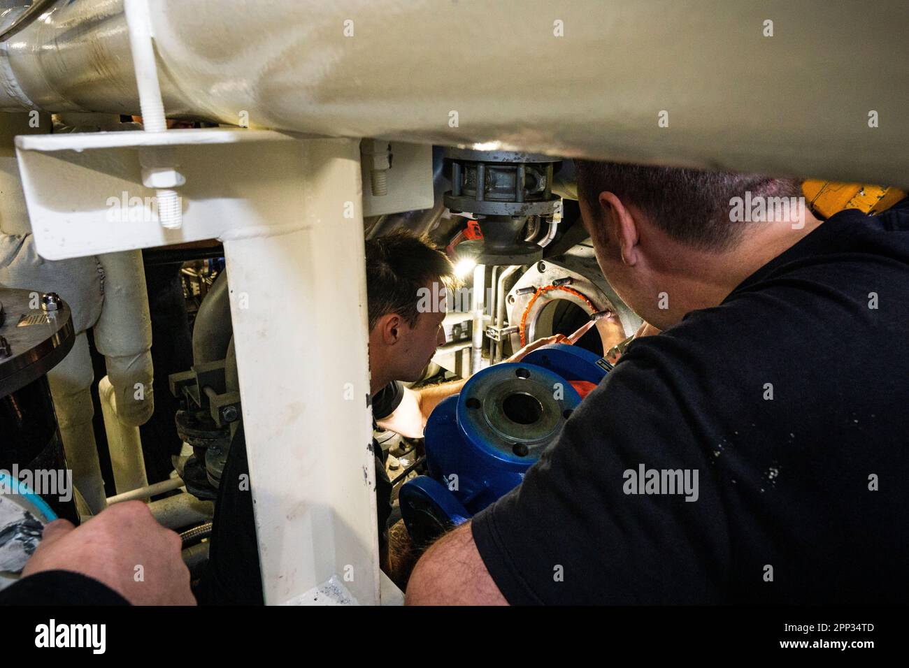 Royal Canadian Navy engineering personnel onboard HMCS Margaret Brooke ...