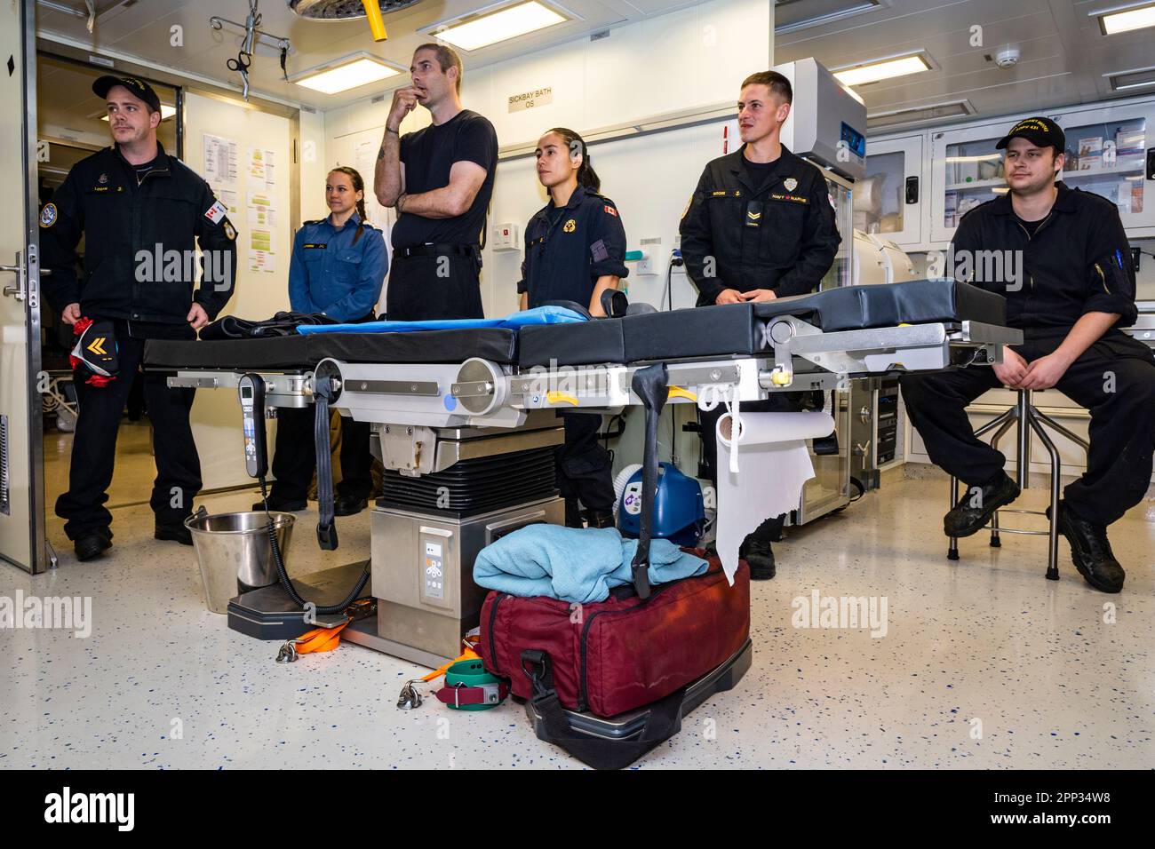 Medical staff instruct the crew during training onboard HMCS Margaret ...