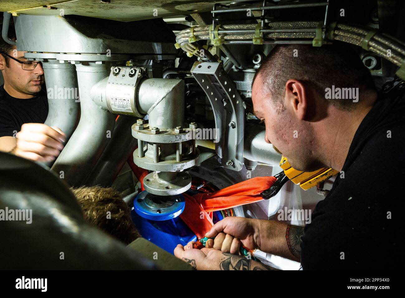 Royal Canadian Navy engineering personnel onboard HMCS Margaret Brooke ...