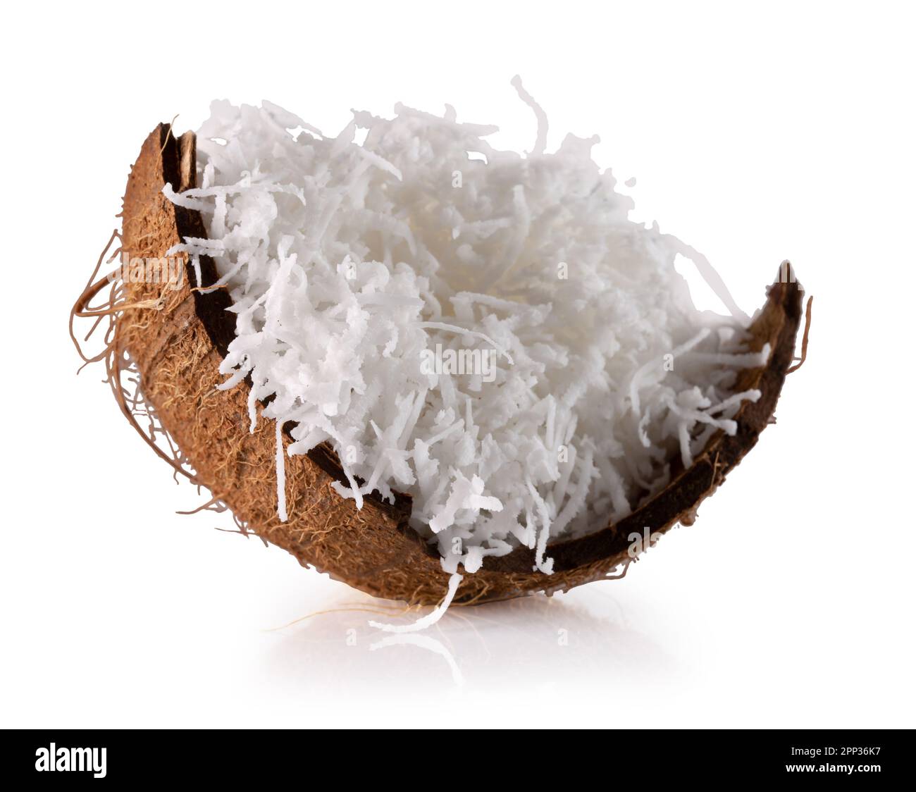 coconut flakes isolated on a white background Stock Photo - Alamy