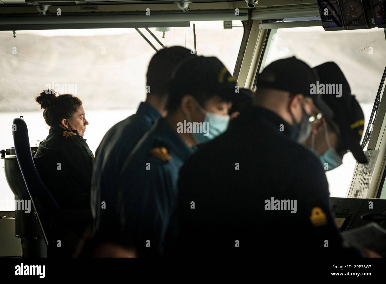 Junior Officers and Commander Nicole Robichaud (background) on the ...