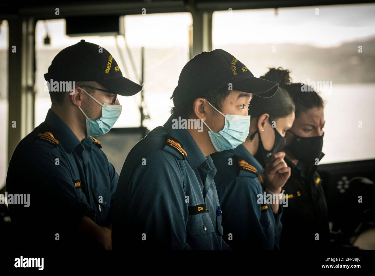 Junior Officers and Commander Nicole Robichaud (background) on the ...