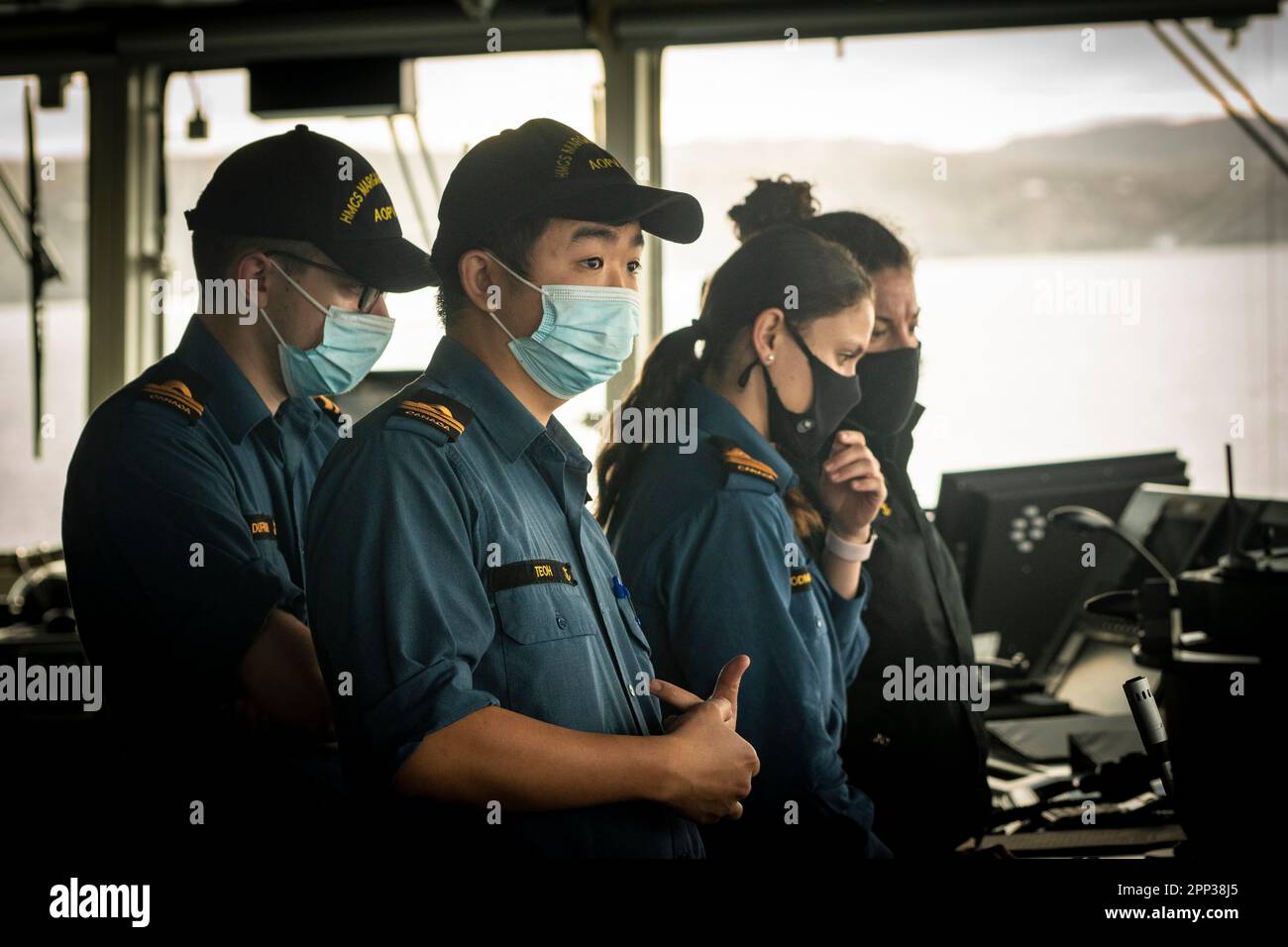 Junior Officers and Commander Nicole Robichaud (background) on the ...