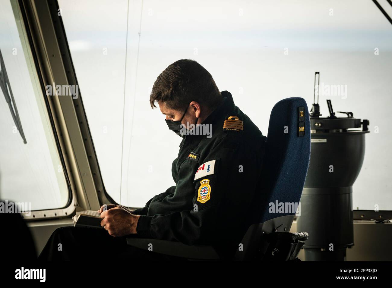 Captain Sheldon Gillis on the bridge of HMCS Margaret Brooke during Op ...