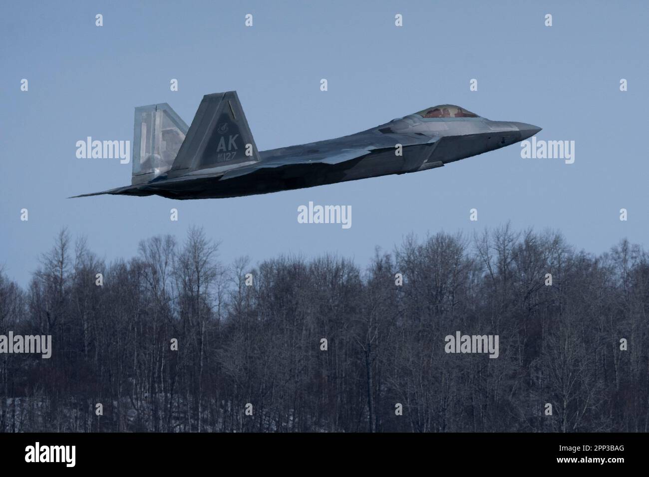 A U.S. Air Force F-22 Raptor assigned to the 3rd Wing takes off at ...