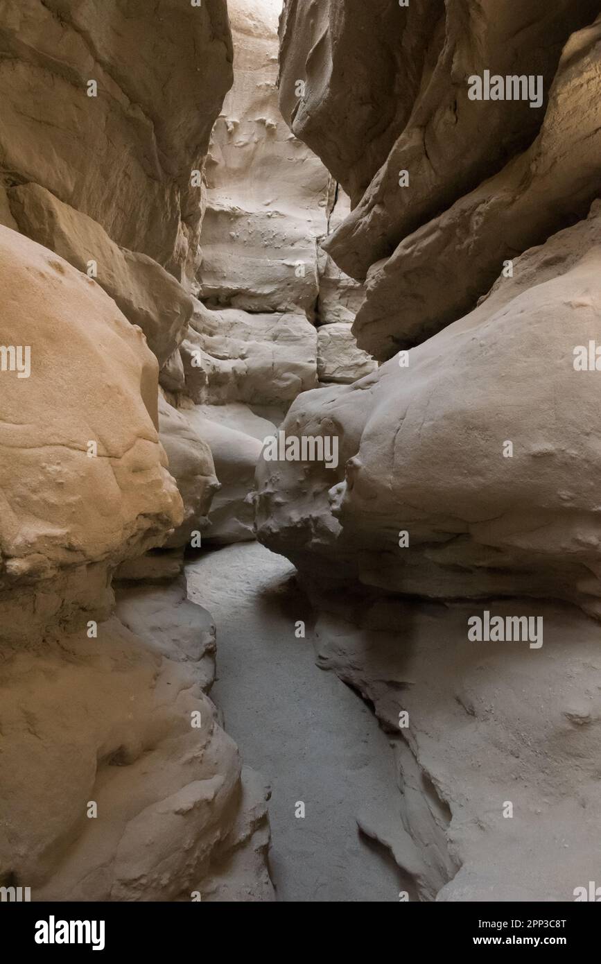 A narrow passage through The Slot, a slot canyon hiking trail in Anza ...