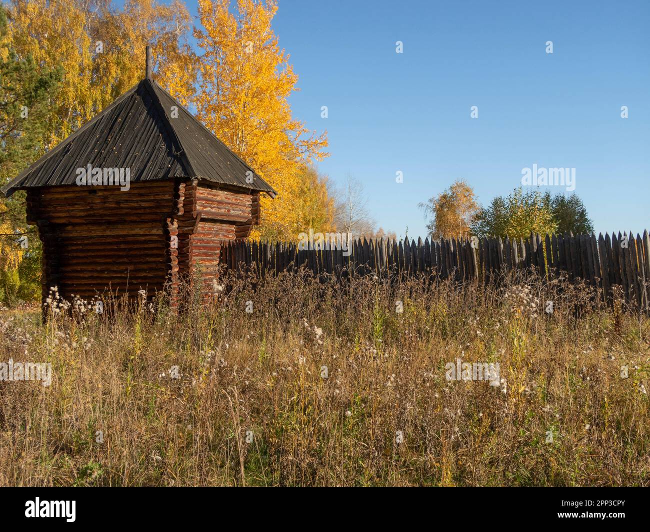 Reconstructed wooden watchtower of the 17th century and a palisade made ...