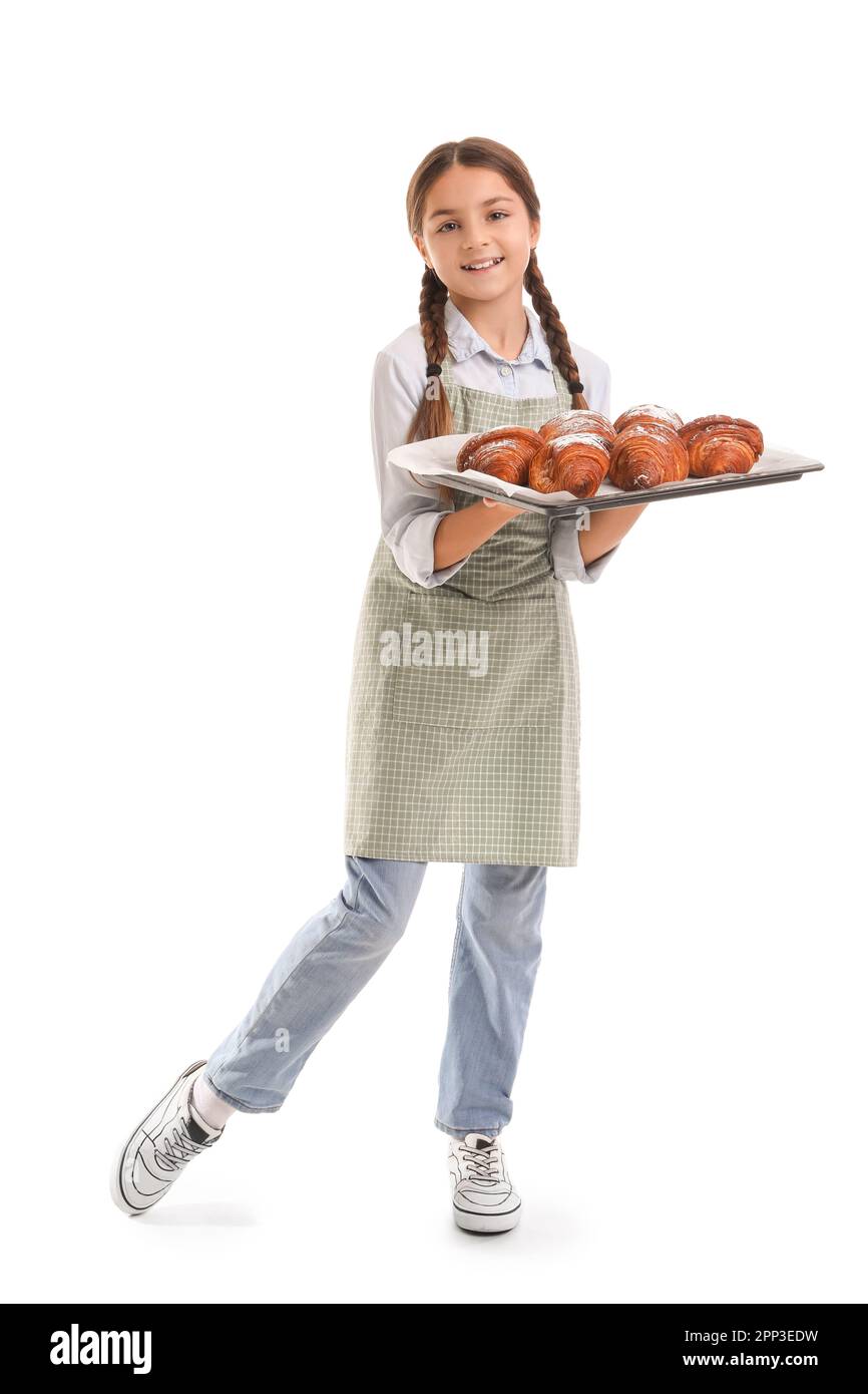 Little baker with tray of tasty croissants on white background Stock ...