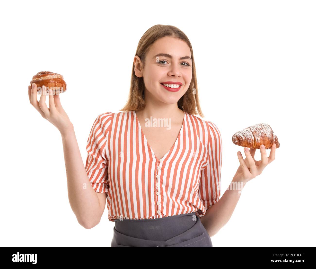 Female baker with tasty croissant and bun on white background Stock ...
