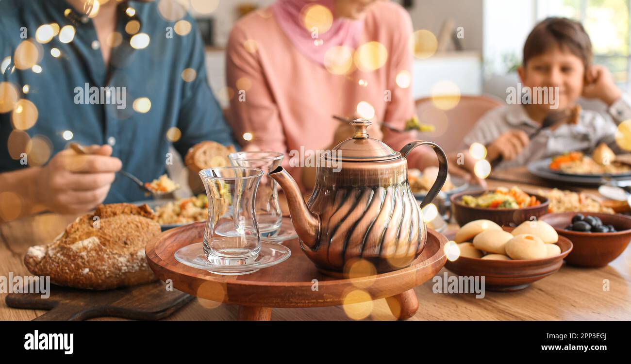 Vintage teapot with glass cups on dining table Stock Photo - Alamy