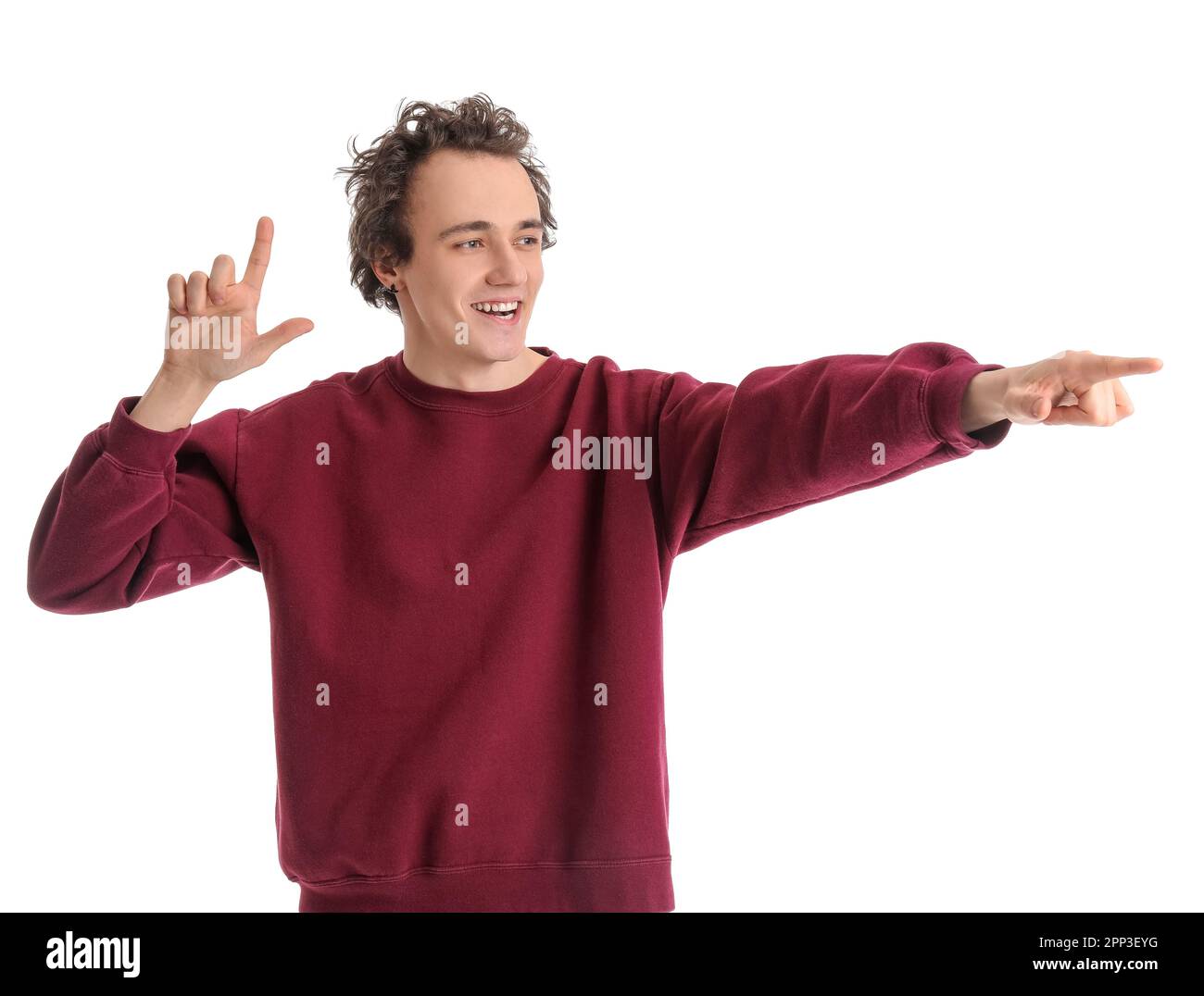 Young man showing loser gesture on white background Stock Photo - Alamy