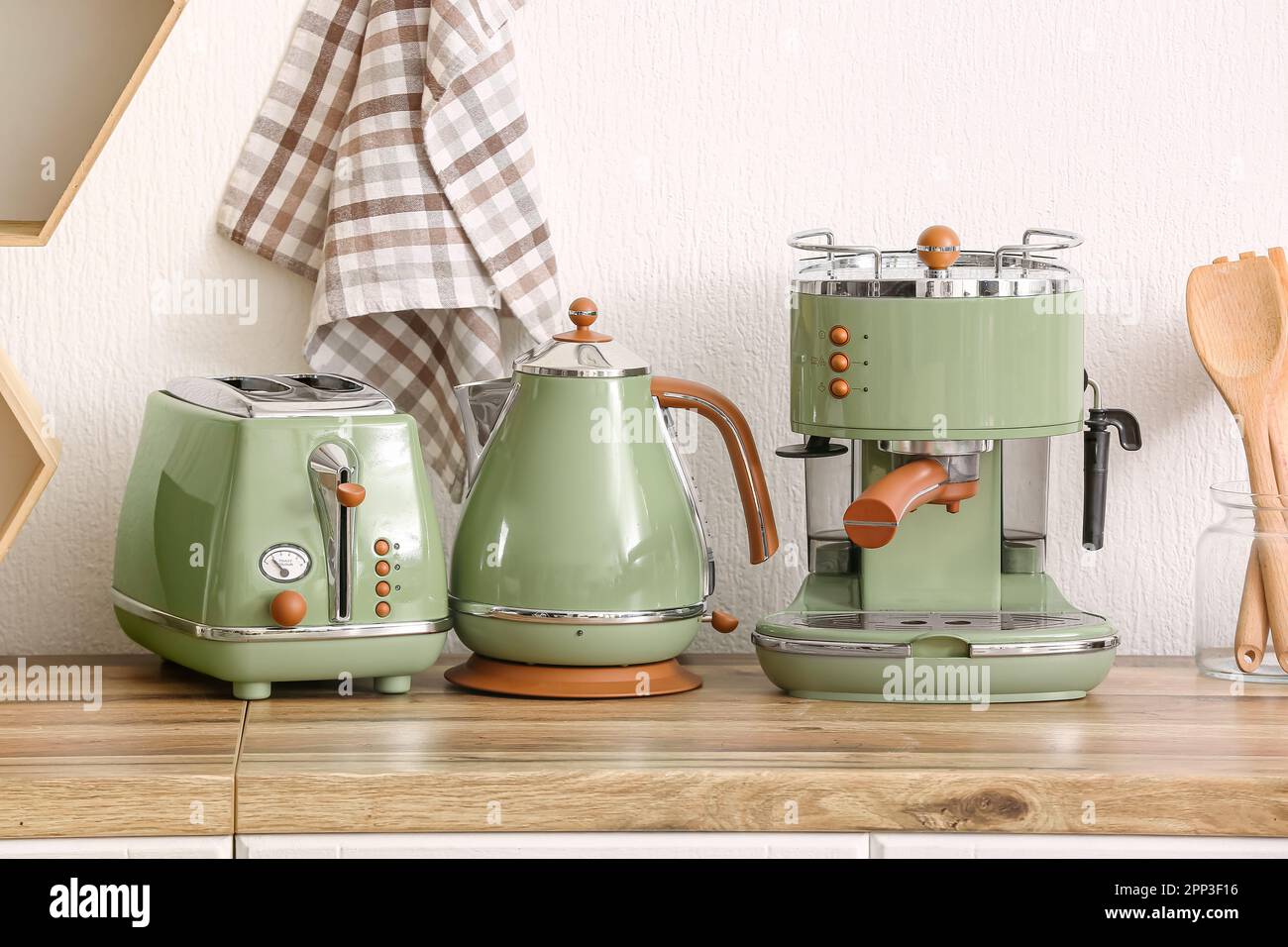 Coffee machine, toaster and electric kettle on kitchen counter Stock ...
