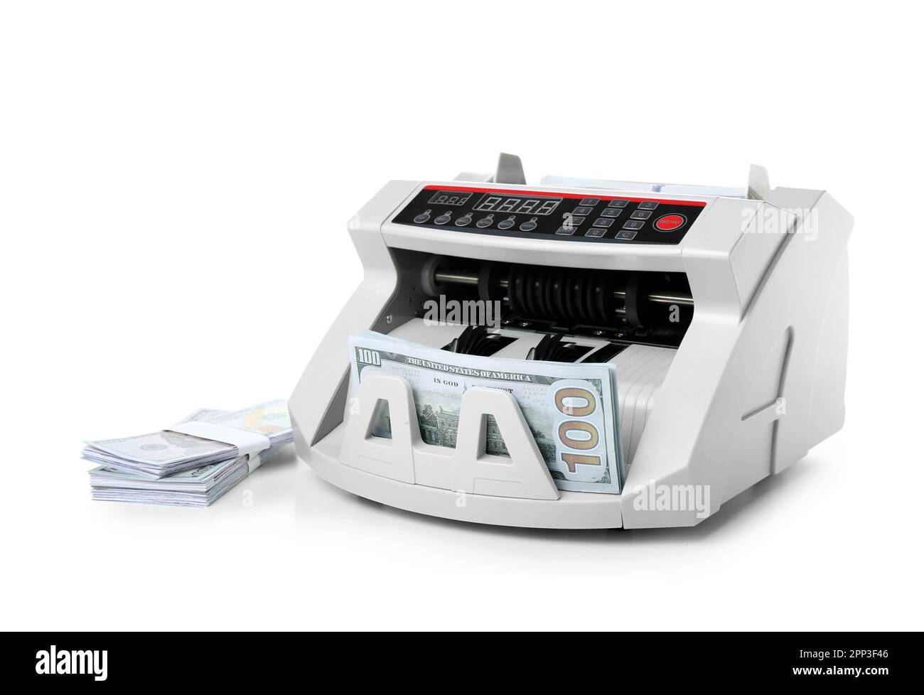 Modern cash counting machine with dollar banknotes on white background ...