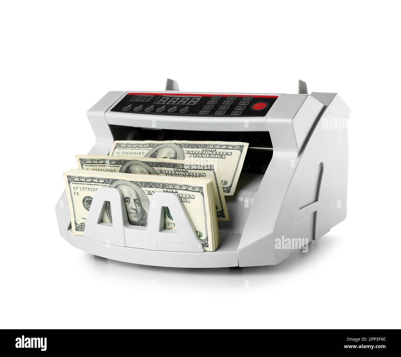 Modern cash counting machine with dollar banknotes on white background ...