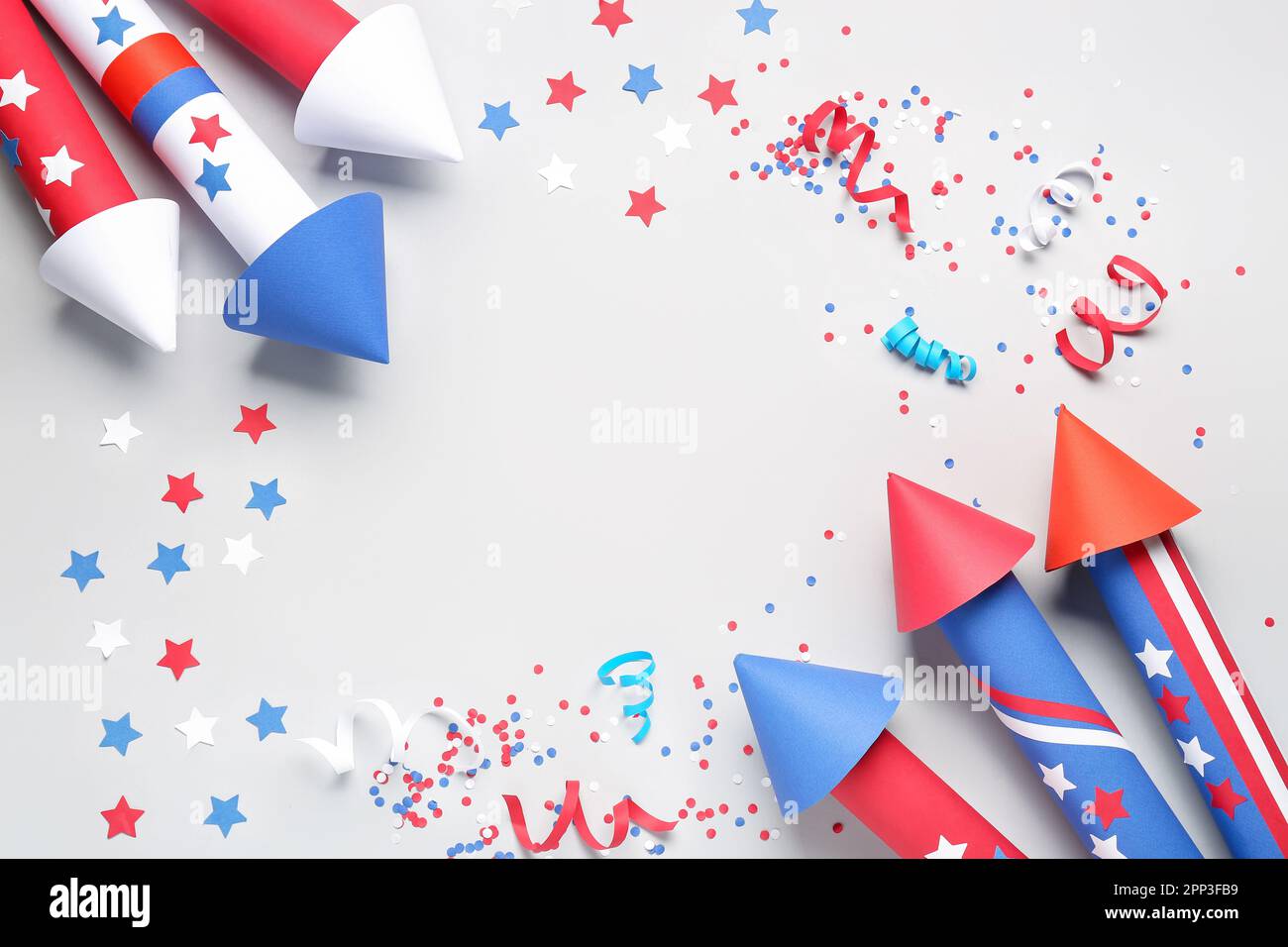 Frame made of firework rockets, serpentine and confetti for ...