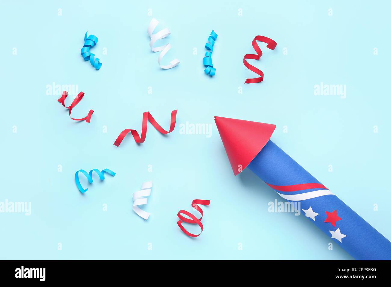 Firework rocket and serpentine for Independence Day on blue background ...