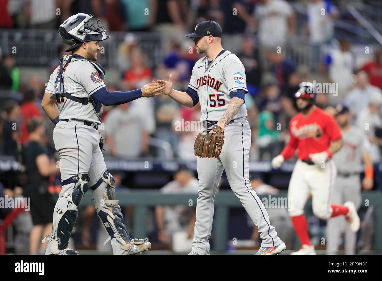 ATLANTA, GA - APRIL 21: Houston Astros catcher Yainer Diaz (21) slaps ...