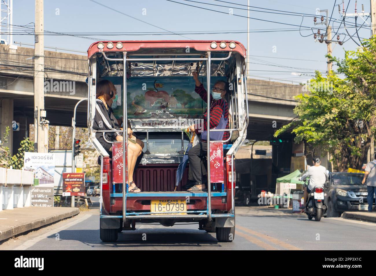 BANGKOK, THAILAND, JAN 28 2023, People are transported in a shared taxi ...