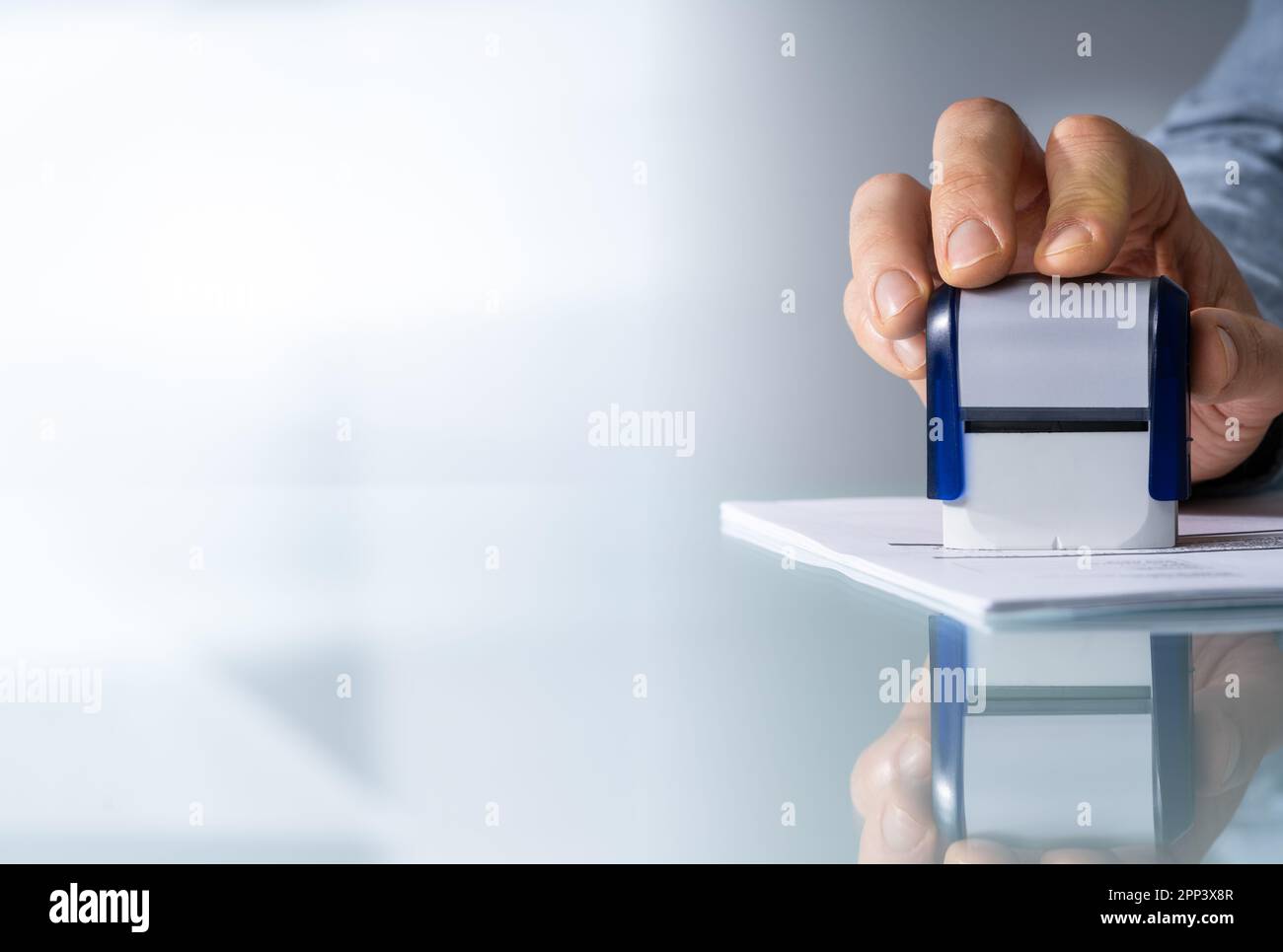 Persons hand stamping approved hi-res stock photography and images - Alamy