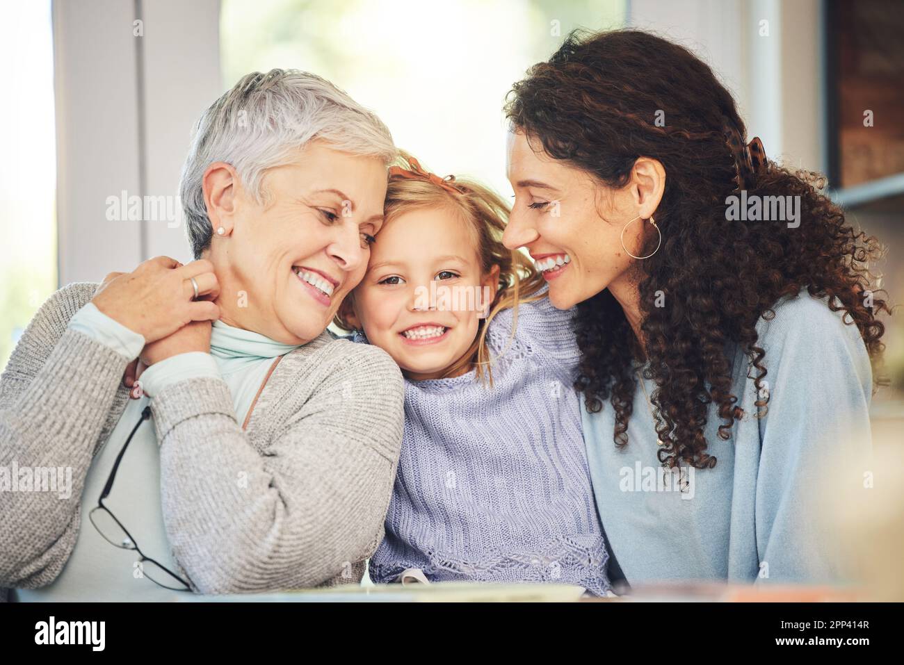 Portrait, grandmother and girl smile with mother in home, bonding and ...