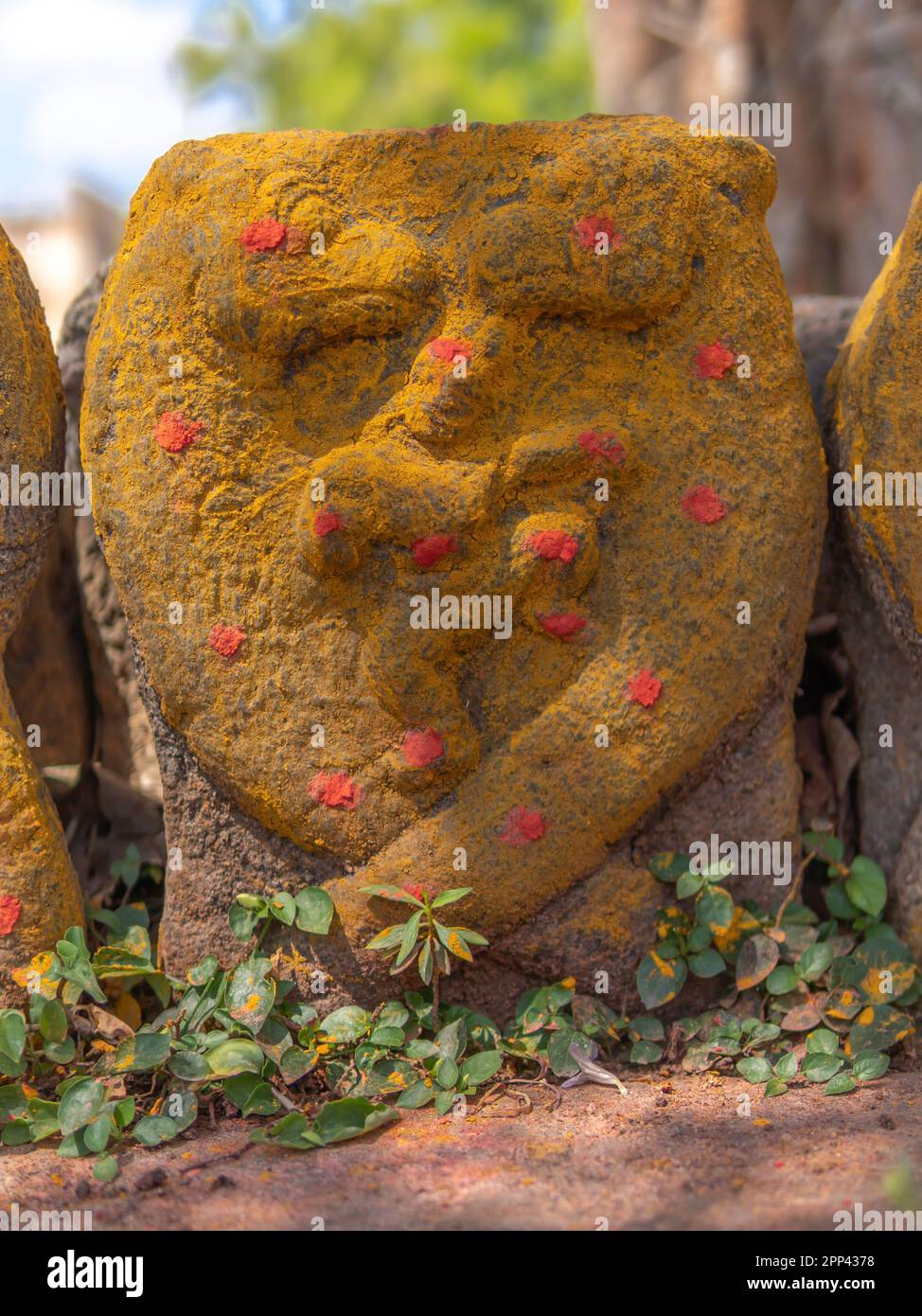 Statue of lord krishna dancing between two snake gods. Statue covered ...